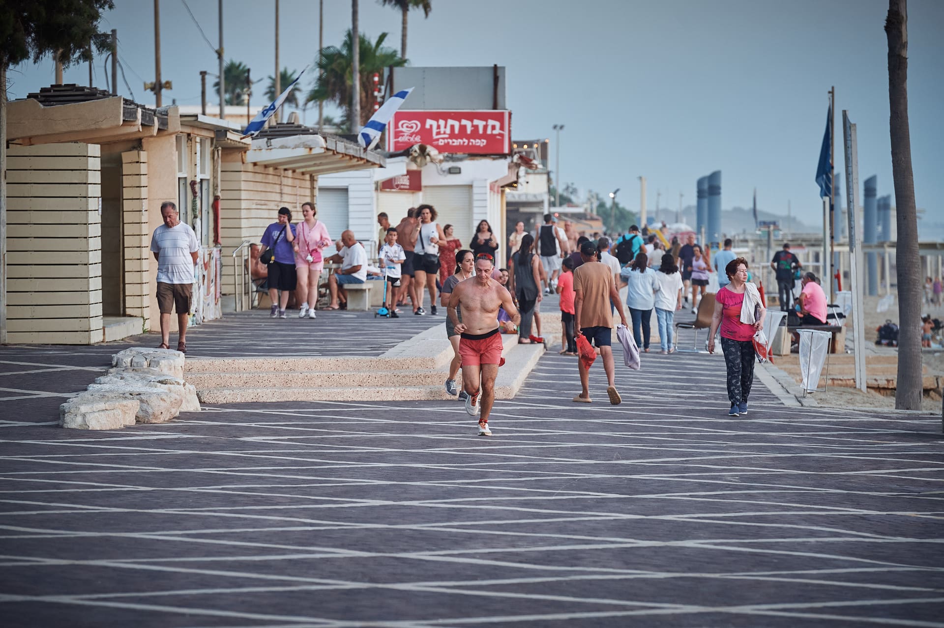 Dado Beach and Carmel Beach in Haifa July 18, 2025 (Photo/ Sharon ...